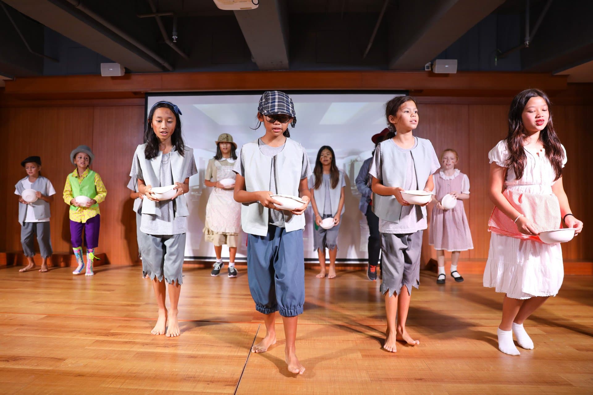 BISP KS2 Students Perform ‘Selections from Oliver’ | British ...